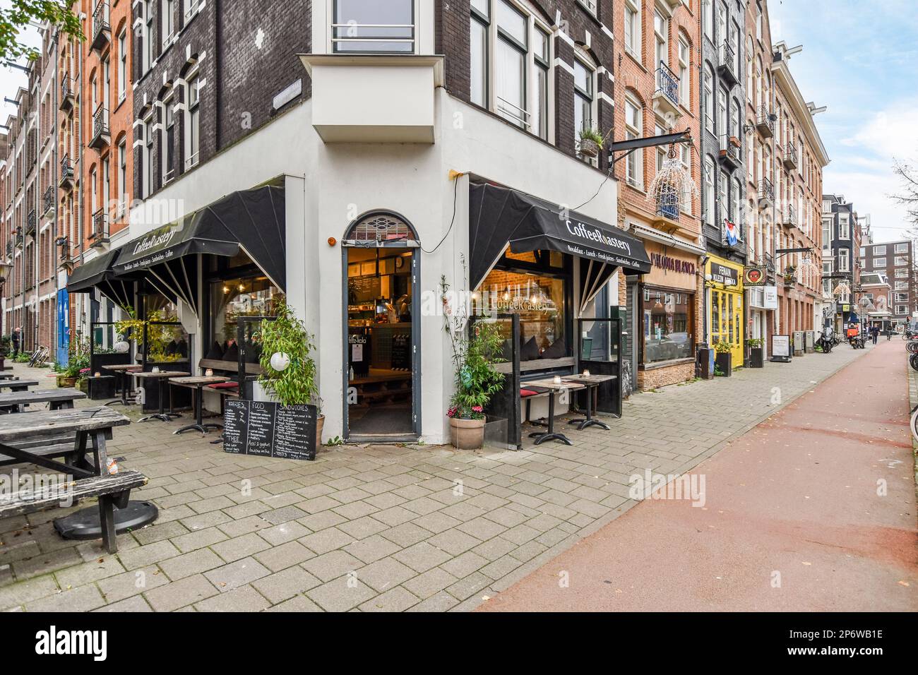 Amsterdam, Netherlands - 10 April, 2021: an outside area with tables ...
