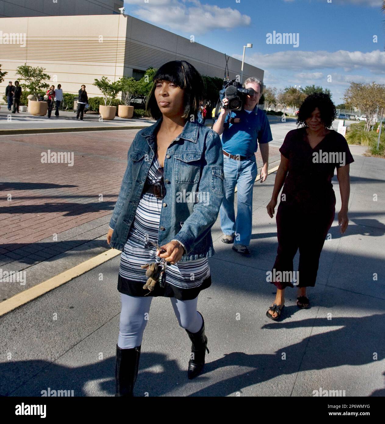 Deneen Sweat, front, mother of murder defendant Nicholas Lindsey ...