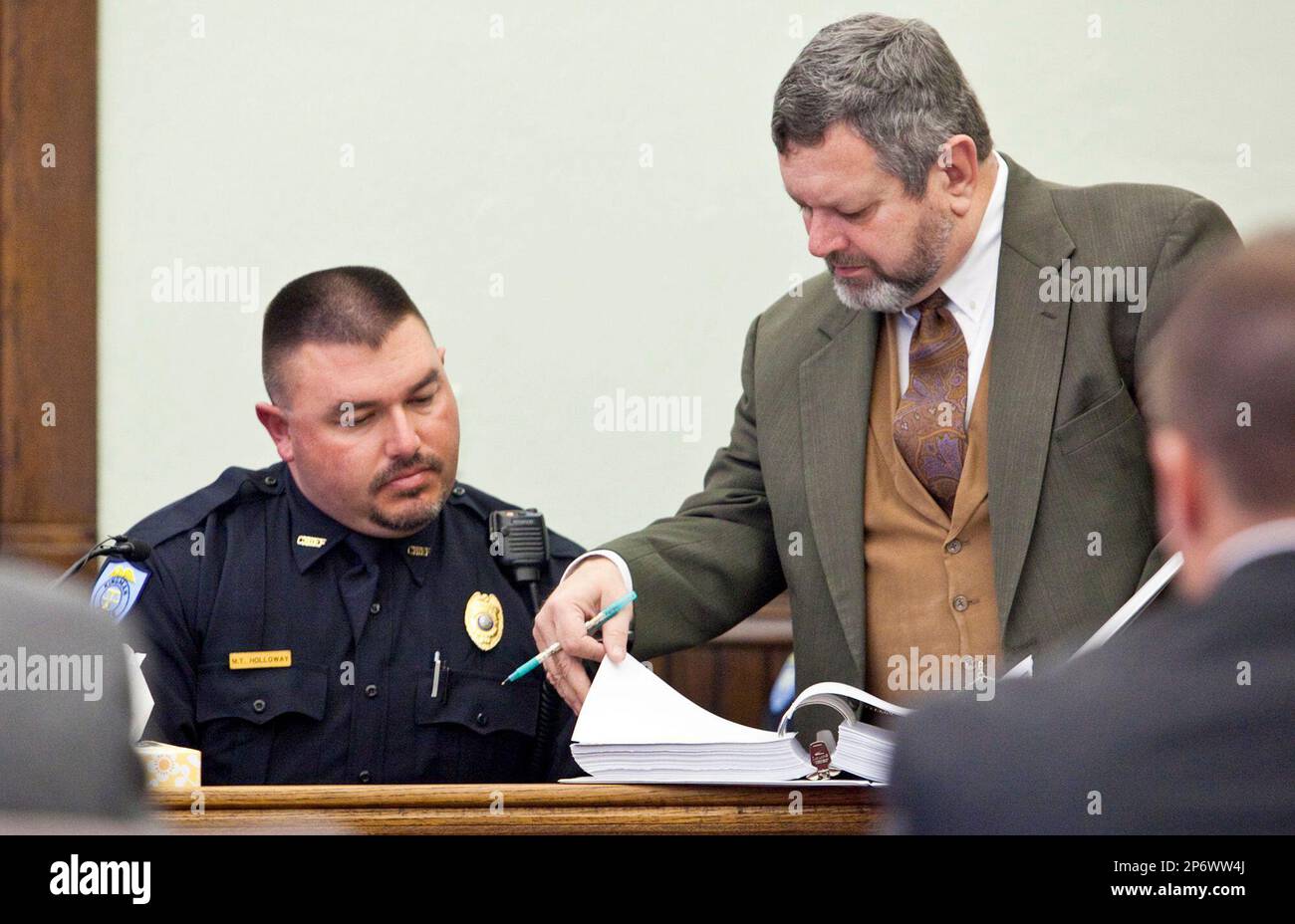 Defense attorney Roger Falk questions Kingman Police Chief Marc ...