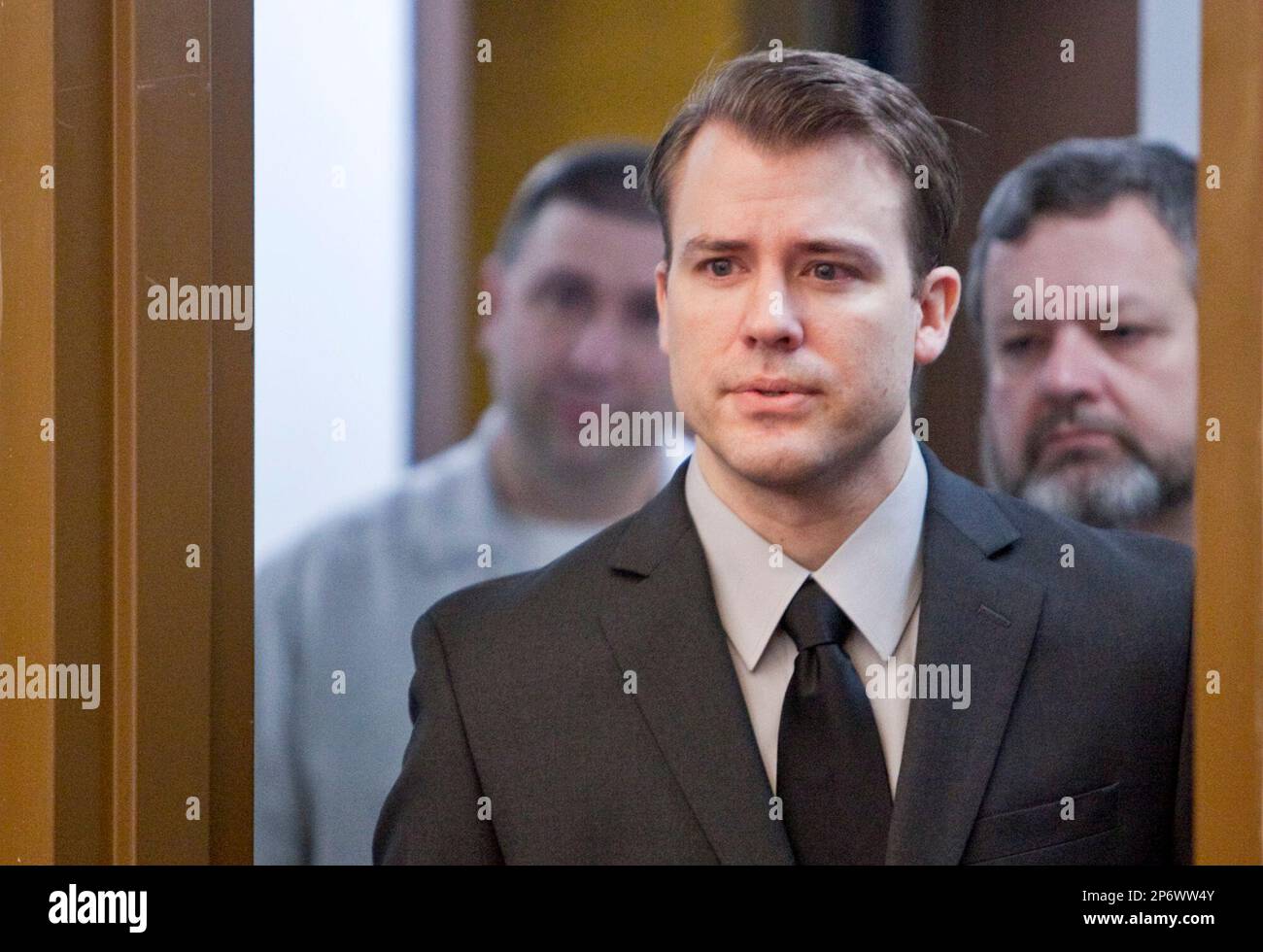 Brett Seacat enters a Kingman County courtroom in Kingman, Kan. Tuesday ...