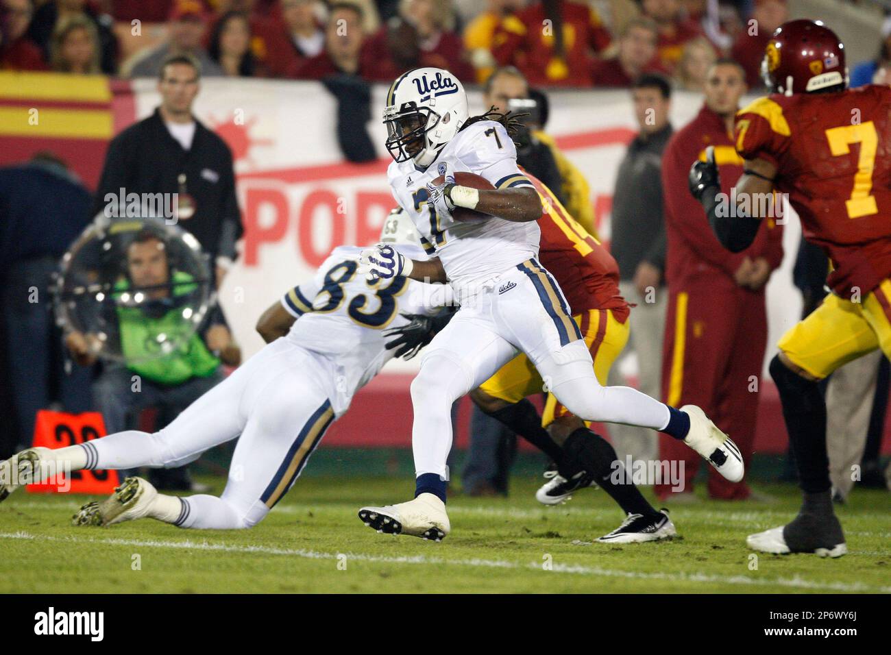 November 26, 2011: UCLA Bruins wide receiver Josh Smith #7 is tackled ...
