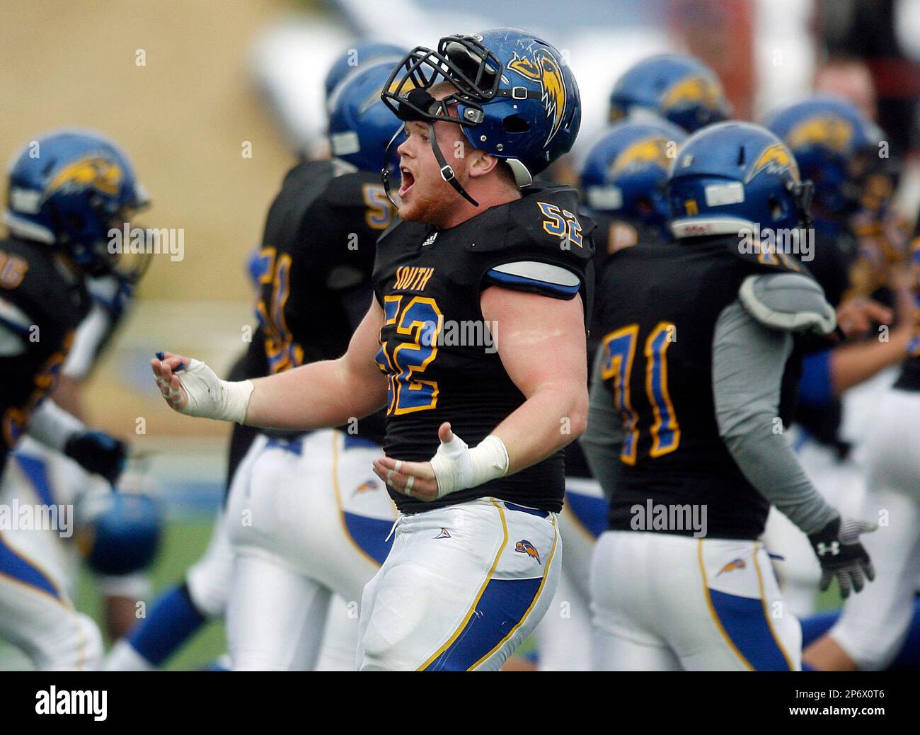 Olathe South's Jared Douglas celebrates after defeating Wichita Heights ...