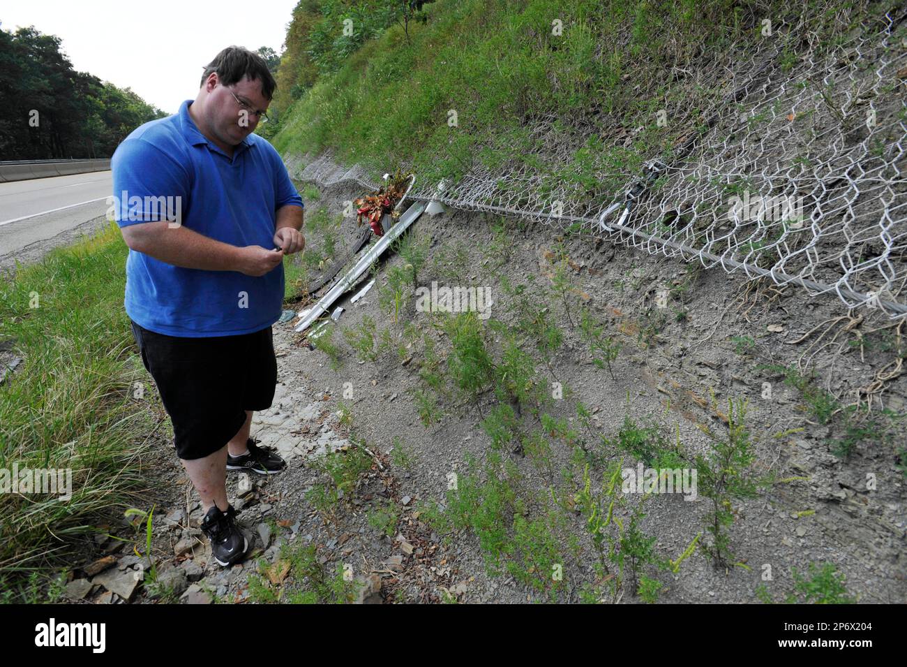 In this Aug. 26, 2009 photo, Rev. Ewing Marietta stands next to a ...