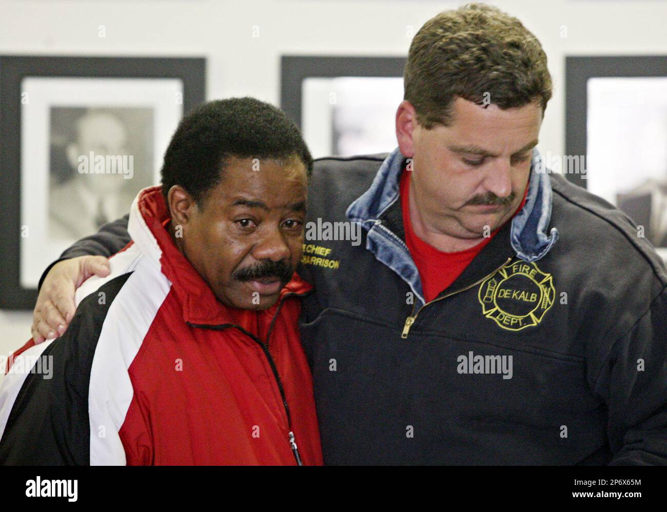 Dr. Larry D. Bolles (left), a representative of the Northern Illinois ...