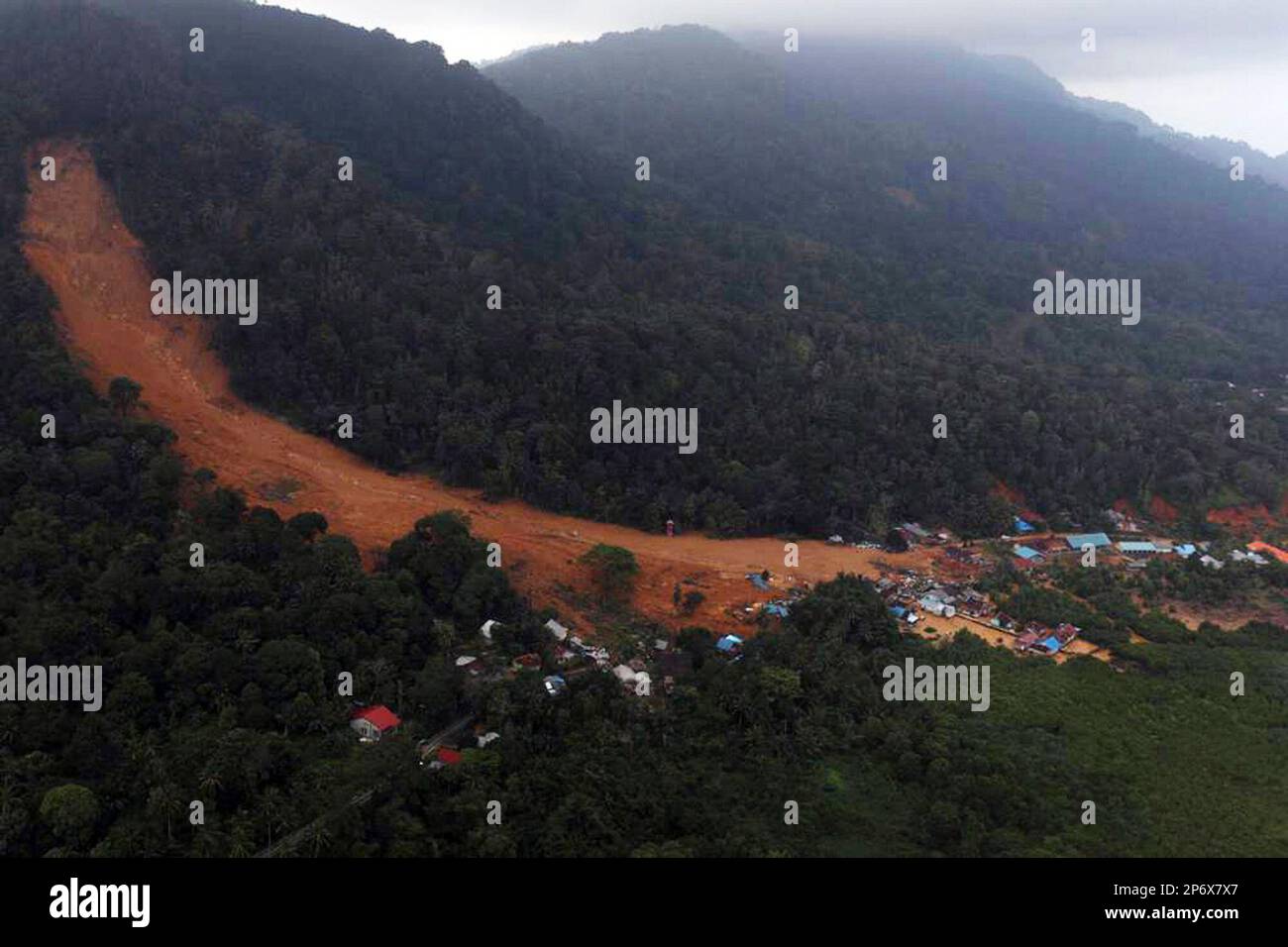 This aerial photo released by Indonesia's National Disaster Management ...