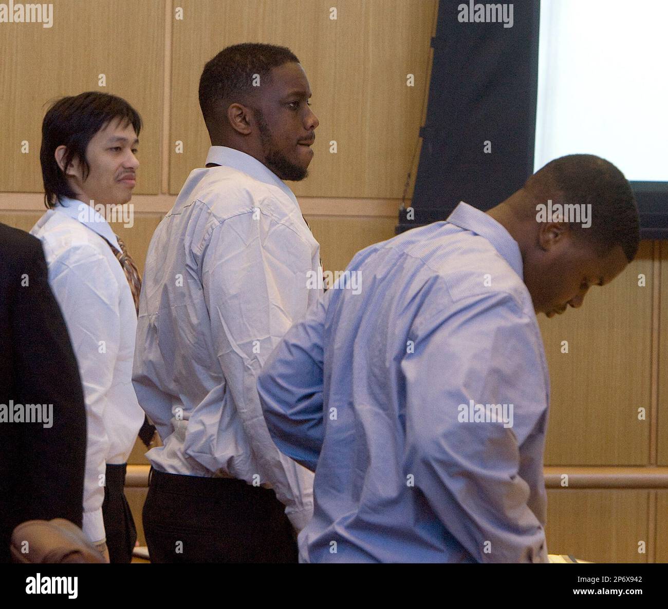Defendants, from the left, Doung Dai Nguyen, Dondre Davis, and Stephen ...