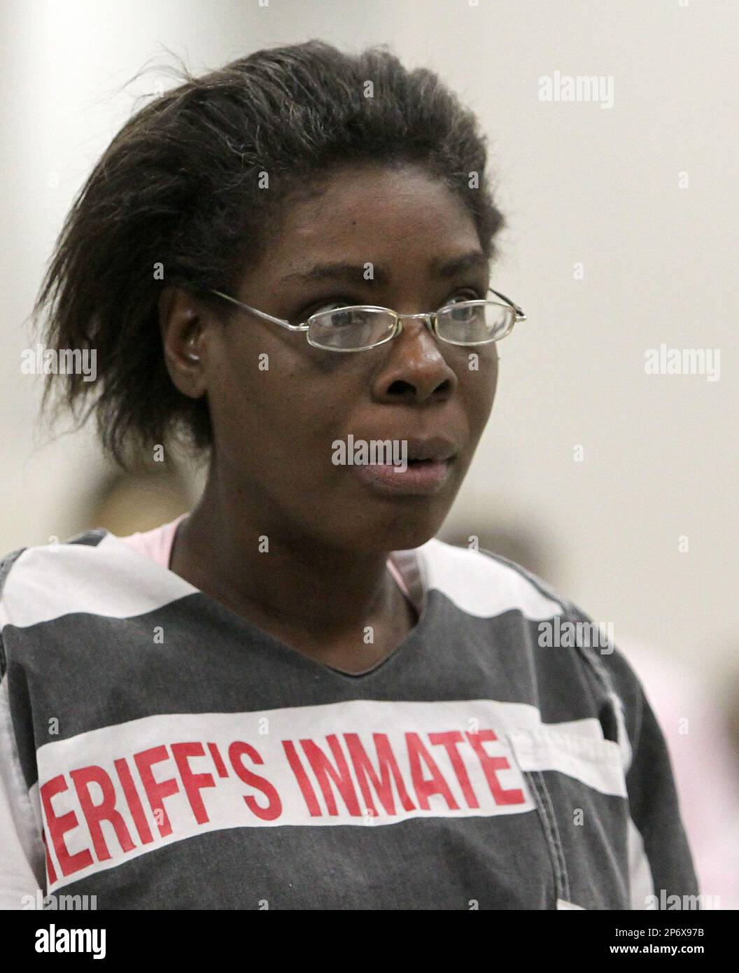 Jerice Hunter reacts as judge Monica Garfinkel explains the charges ...