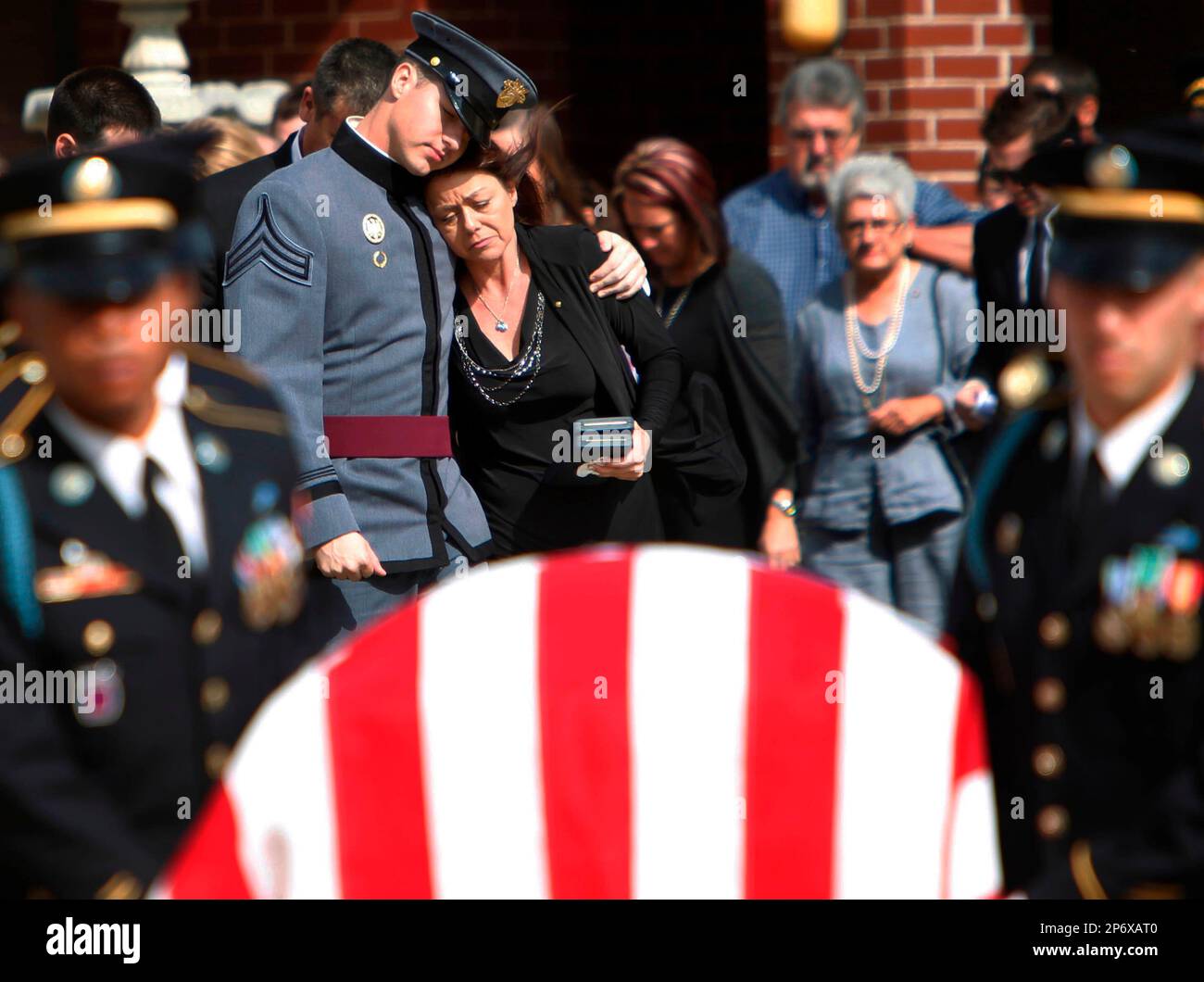 West Point Cadet Lt. Michael Norris embraces his mother, Terri Norris ...