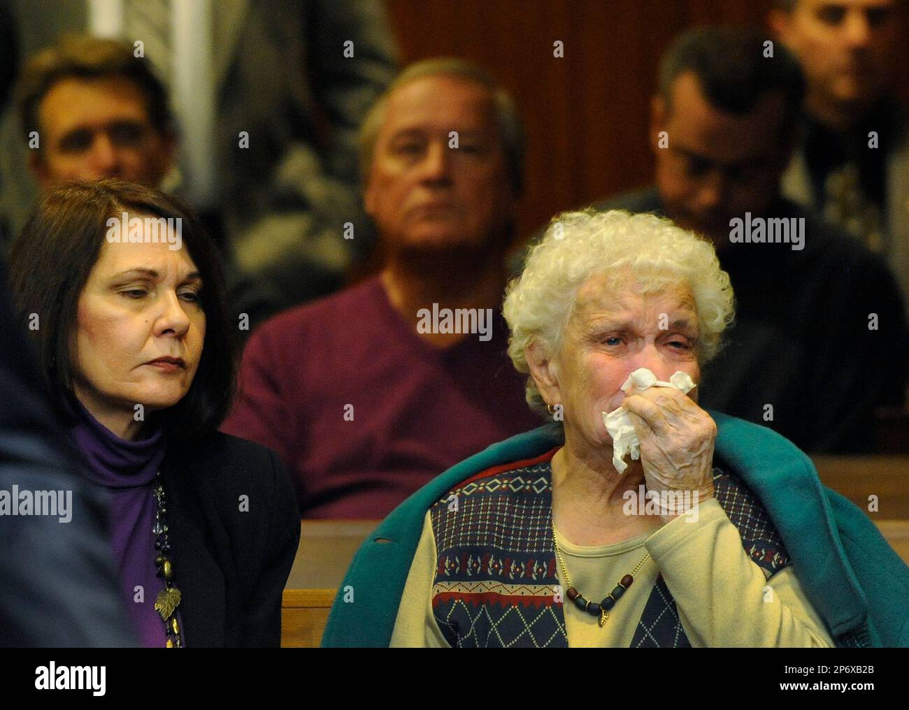 From left, Renee George, second wife of defendant Michael George and ...