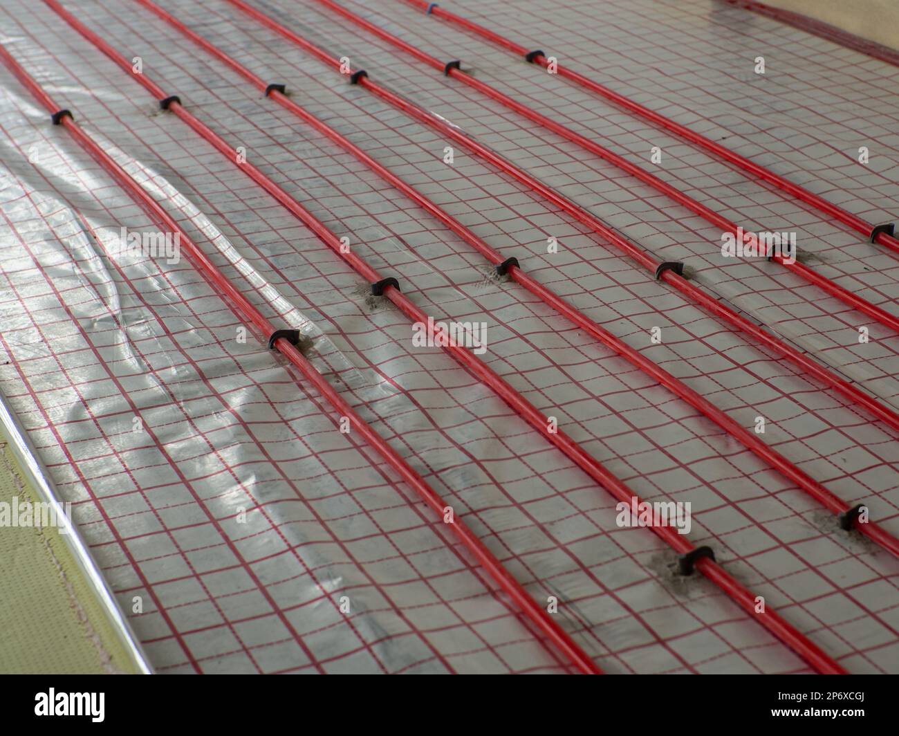 Underfloor heating installation Stock Photo - Alamy