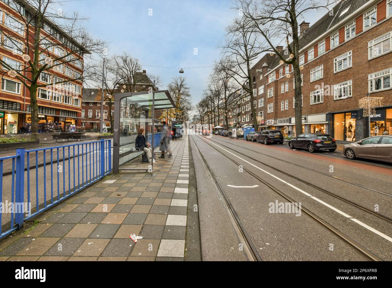 Amsterdam, Netherlands - 10 April, 2021: a city street with people ...