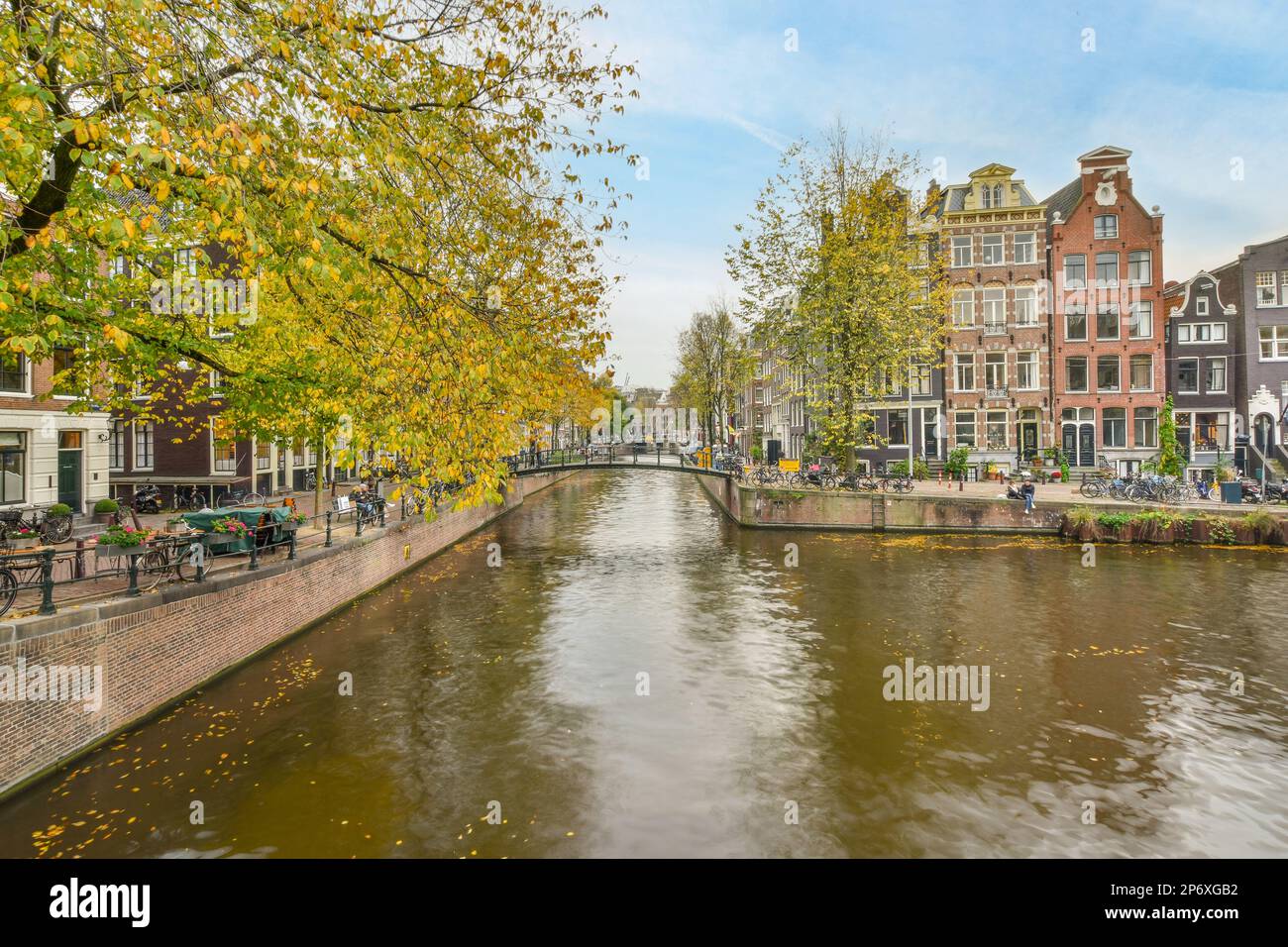 Amsterdam, Netherlands - 10 April, 2021: a canal in the middle of an ...