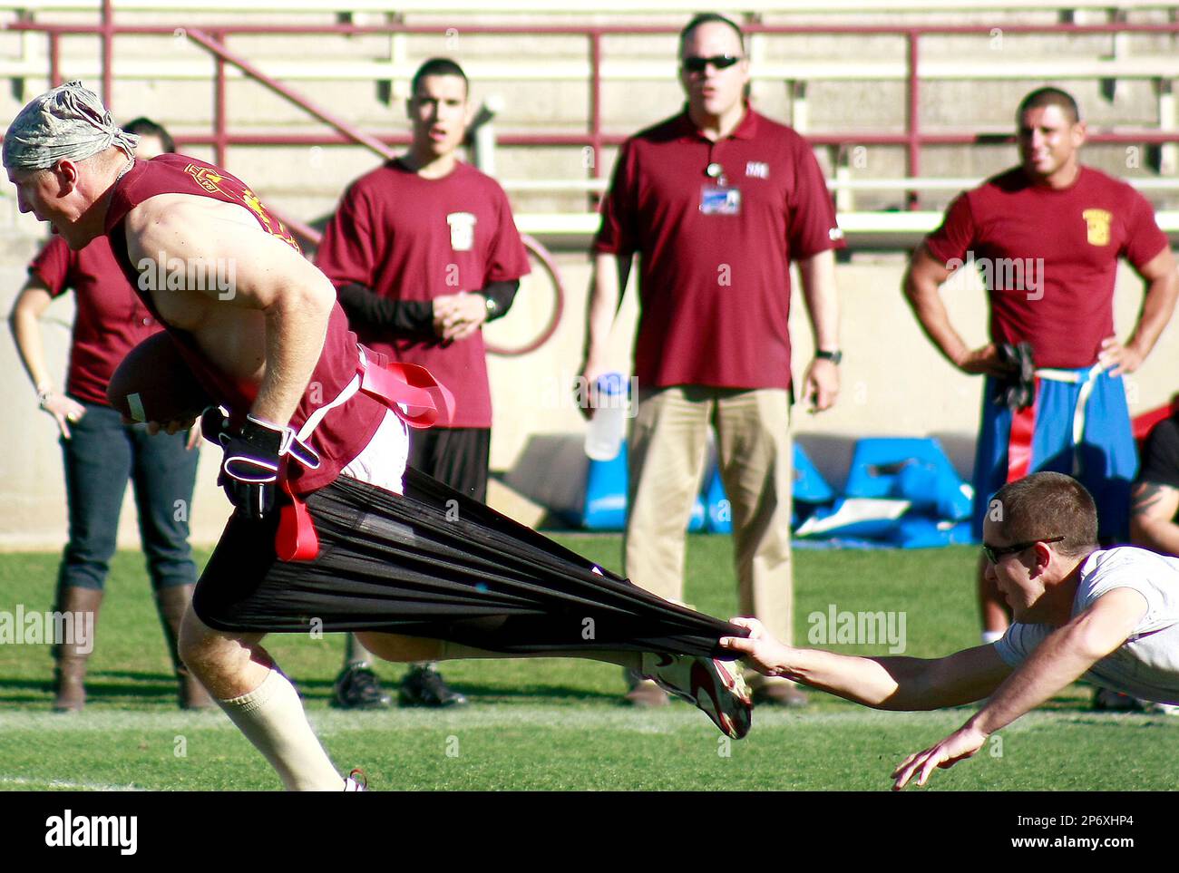 Army ROTC cadet Jason Wuerz, left, has more than his red flags ripped ...