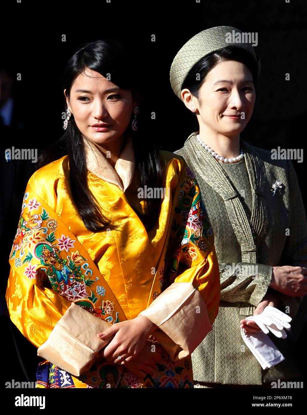 Bhutan's Queen Jetsun Pema Wangchuck, left, and Japan's Princess Kiko attend a welcome ceremony ...