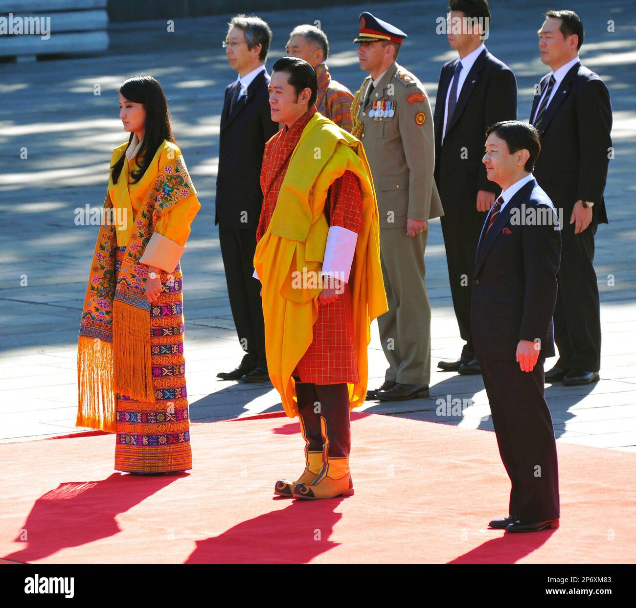 Bhutan's King Jigme Khesar Namgyal Wangchuck, center, and Queen Jetsun Pema, escorted by Japan's ...