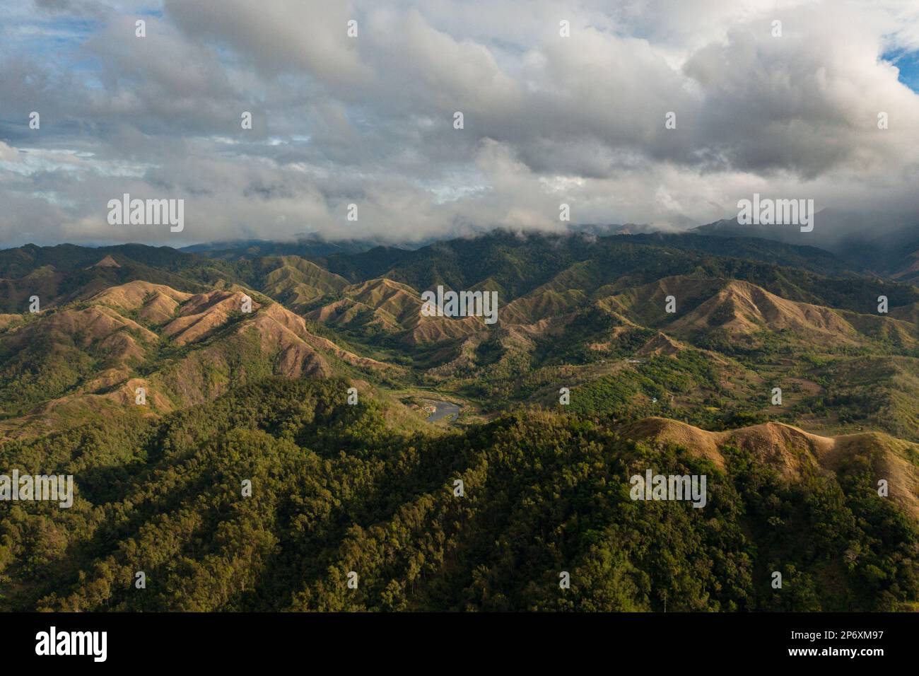 Aerial view of Tropical mountain range and mountain slopes with ...