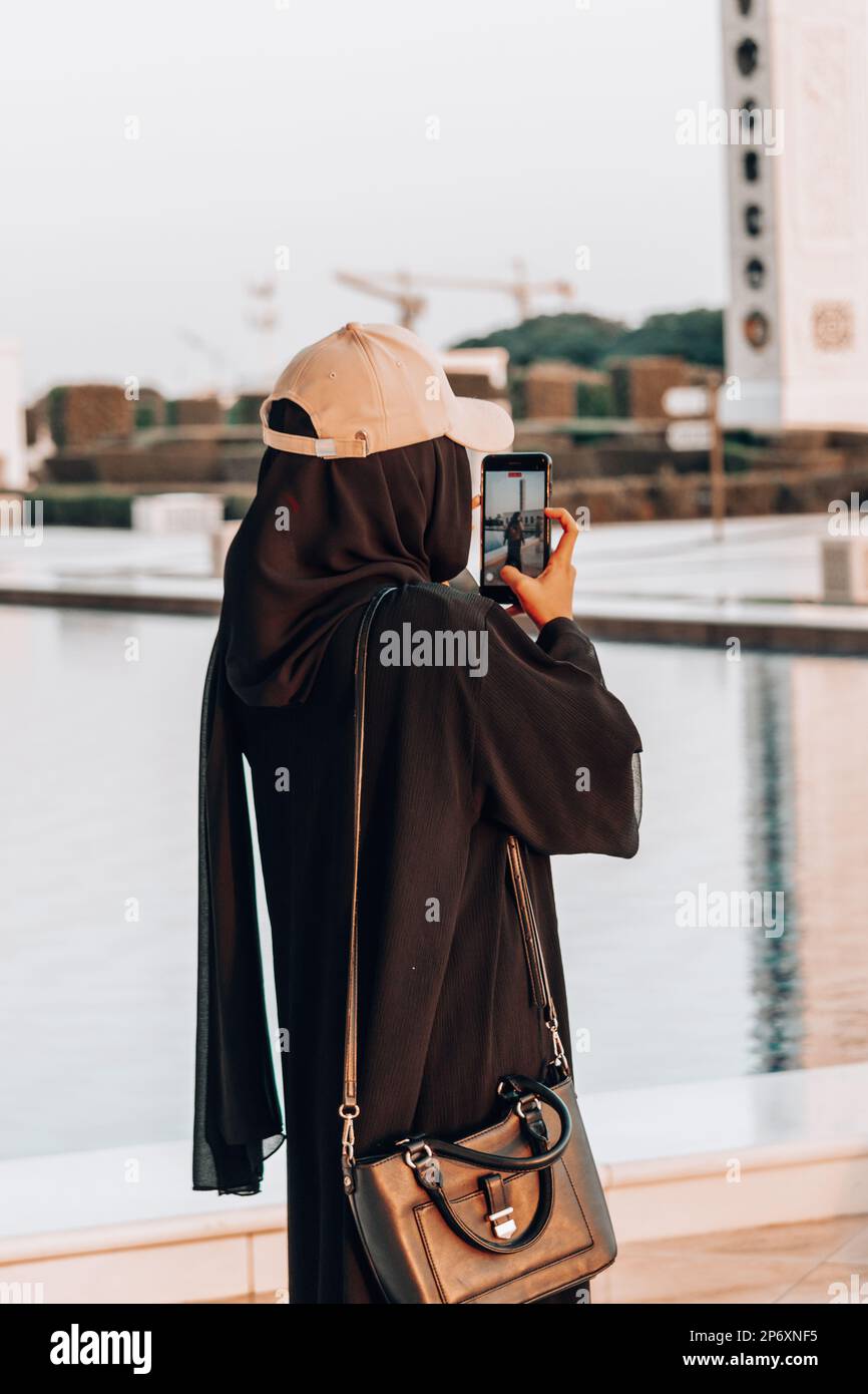 A person taking a picture using phone Stock Photo - Alamy