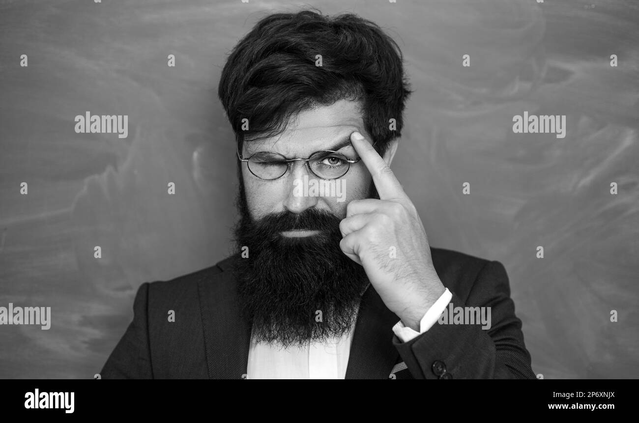 Back to school and happy time. Portrait of bearded professor at school ...