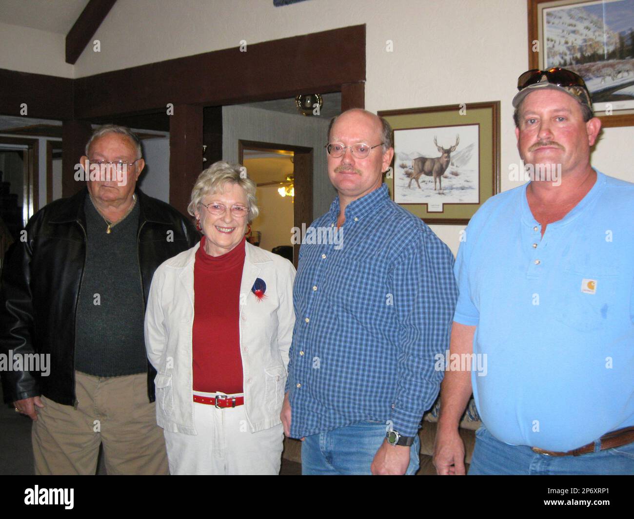 In this Nov. 10, 2011 photo, Nolan Haddon's parents and brothers, left ...