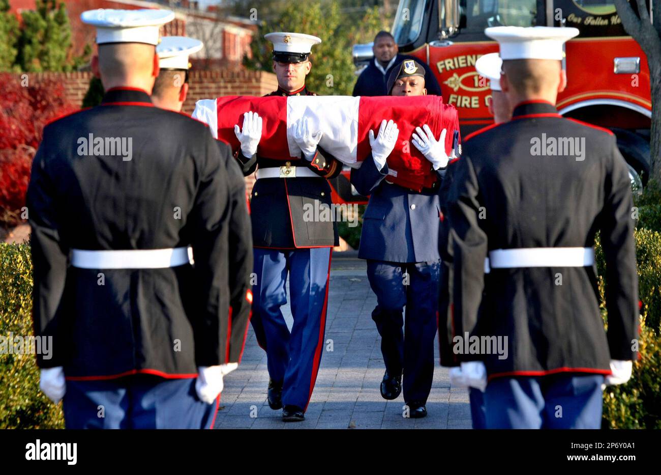 Staff Sgt. Justin English, USMC, facing left and Technical Sgt. Timothy ...