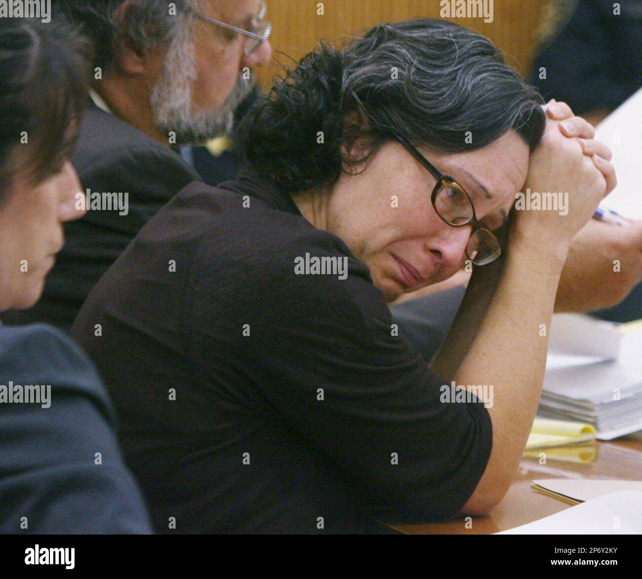 FILE - In this Sept. 23, 2011 file photo, Kimberly Fry, flanked by her ...