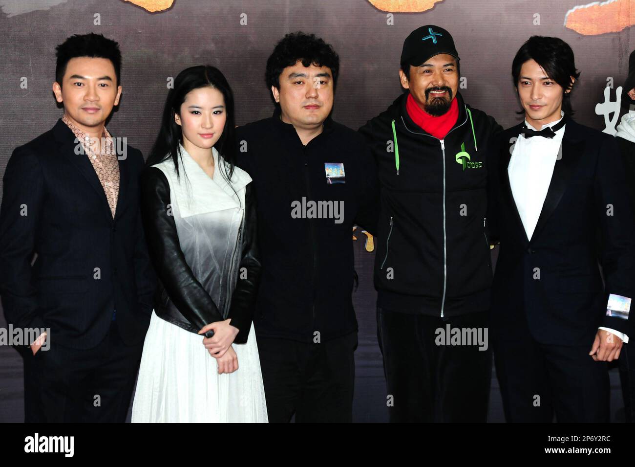From right, Japanese actor Hiroshi Tamaki, Hong Kong actor Chow Yun-fat ...