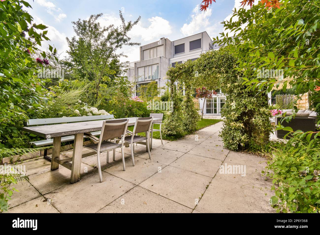 Amsterdam, Netherlands - 10 April, 2021: a patio with table and chairs ...