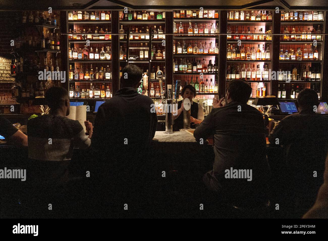 Patron seat at the bar at the Seven Grand, a whiskey bar downtown Los ...