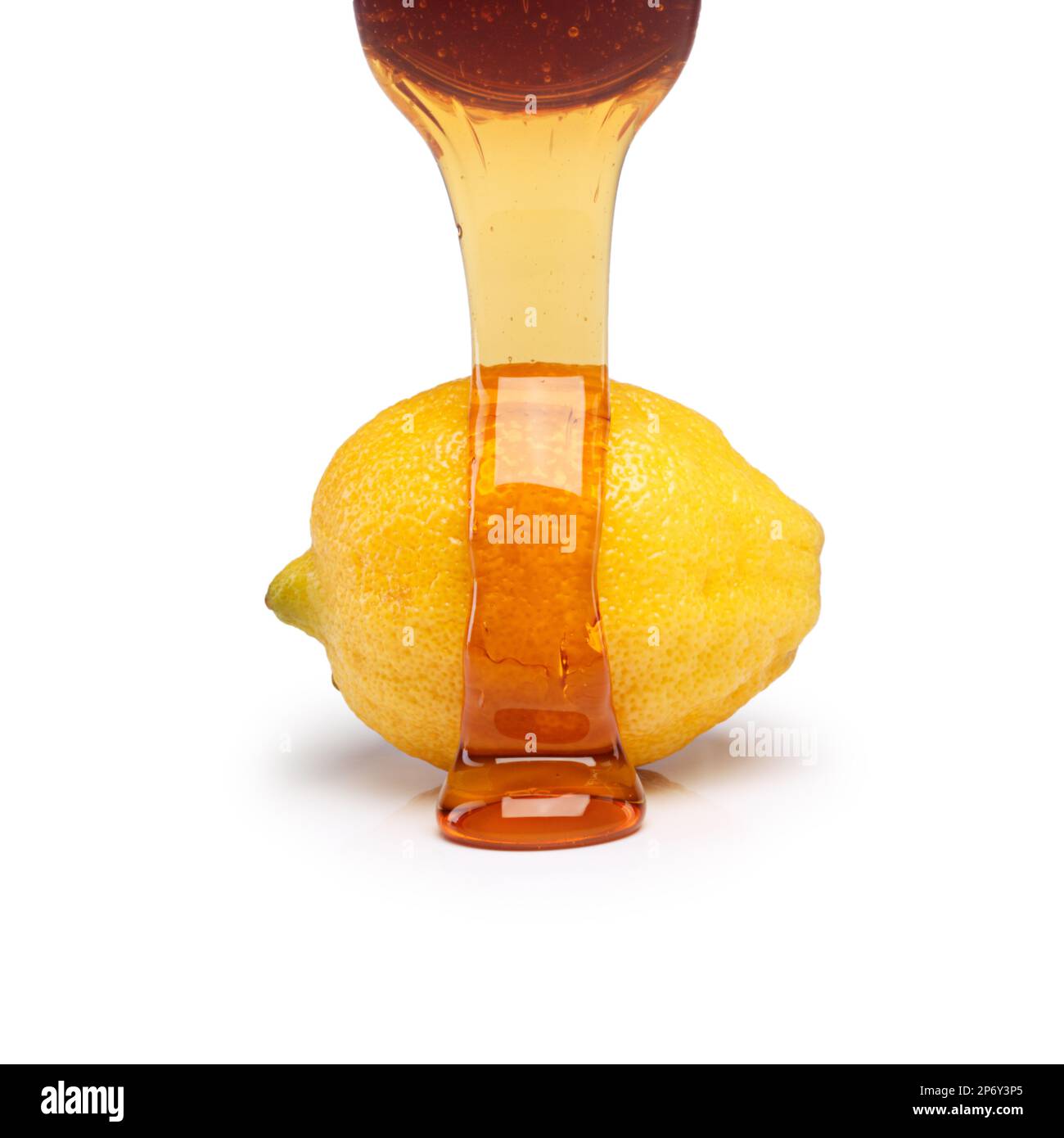 The feel-good combination. Studio shot of honey being poured on top of ...