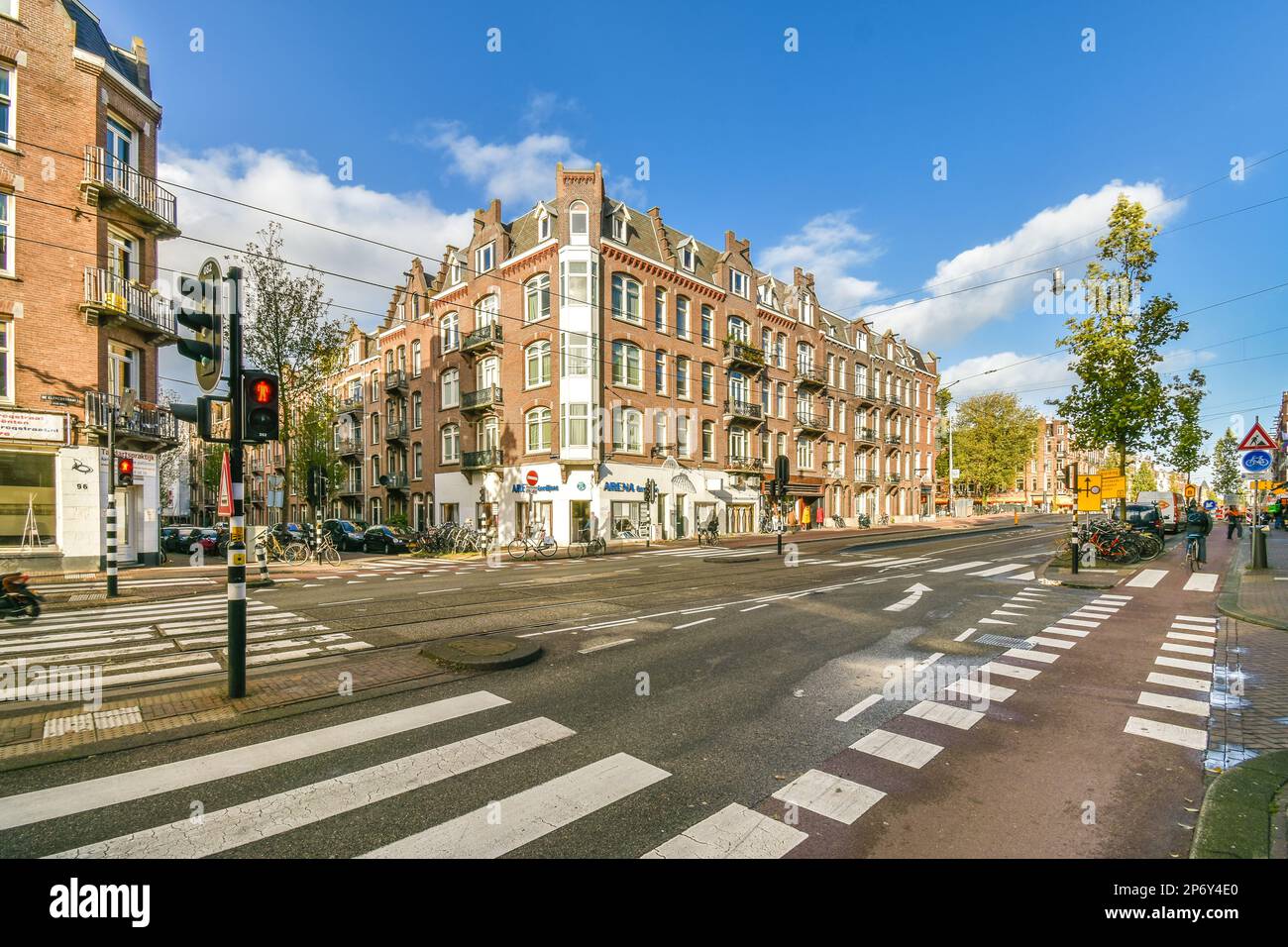 Amsterdam, Netherlands - 10 April, 2021: a city street with buildings ...