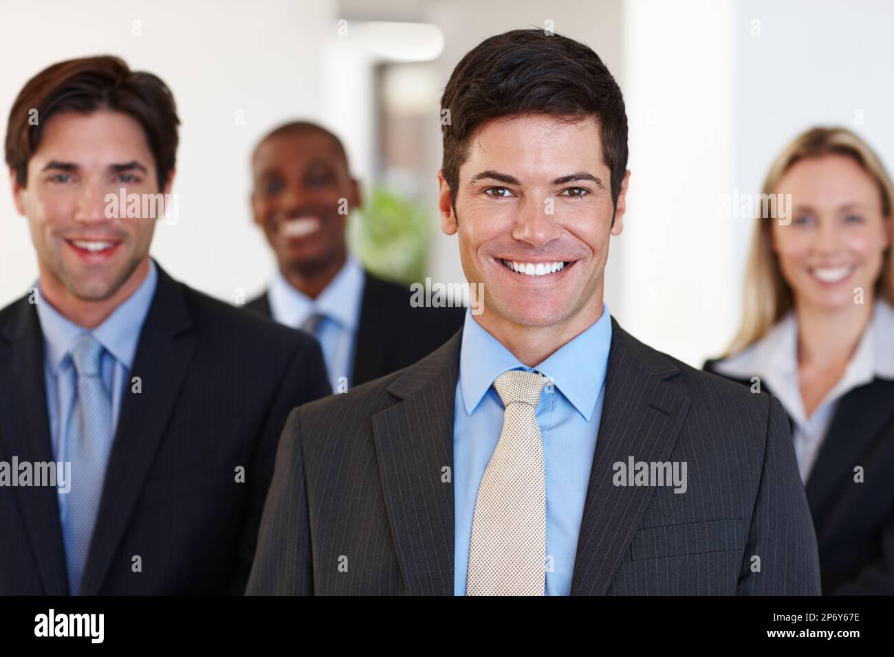 Diversity in the workplace. Portrait of a diverse group of business ...