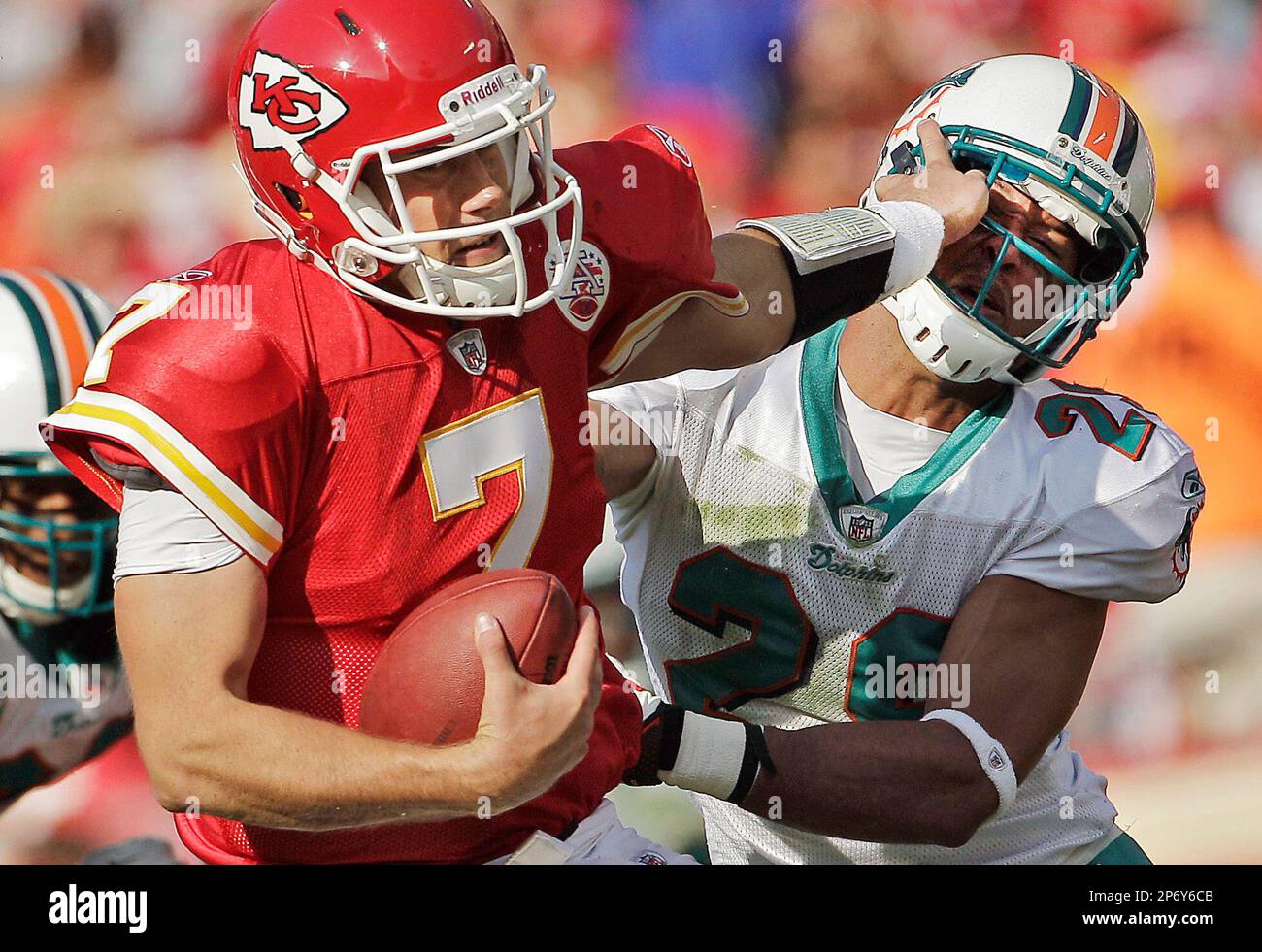 Kansas City Chiefs quarterback Matt Cassel (7) tries to keep Miami ...