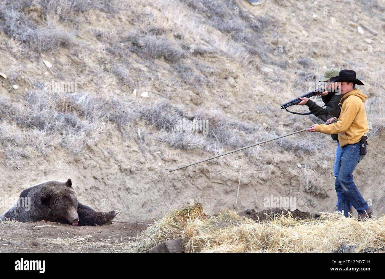 In this May 3, 2011, photo, Dusty Lasseter, front, and Mark Bruscino ...