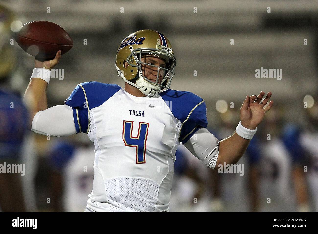 Tulsa quarterback G.J. Kinne (4) warms up prior to an NCAA football ...