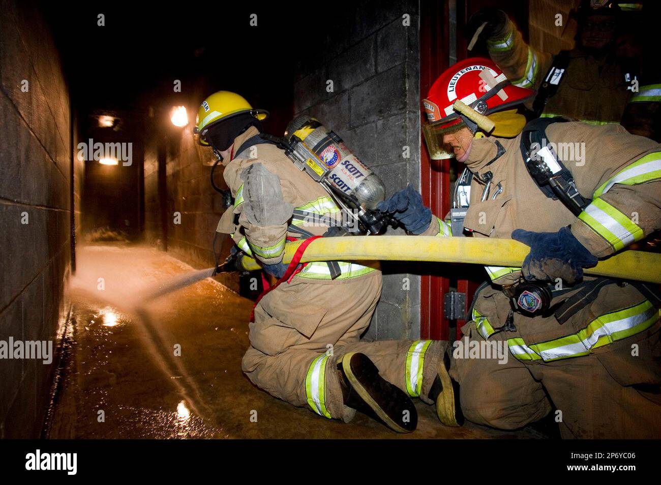 In this Oct. 27, 2011 photo, Lt. Ken Lawrenson, right, follows ...