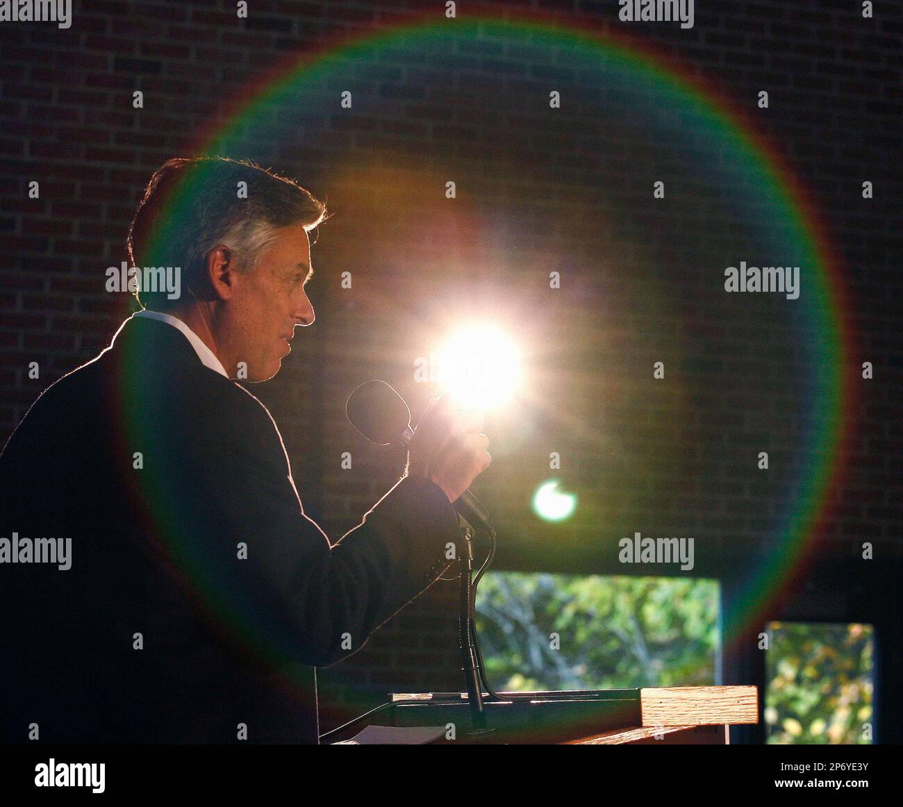 With a rainbow circle highlight from stage lighting, Republican ...