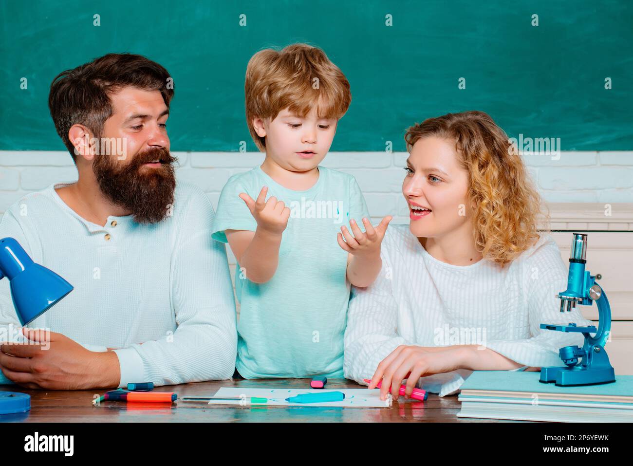 Parent taking child to school. Little child school boy in first grade ... Parent taking child to school. Little child school boy in first grade ...