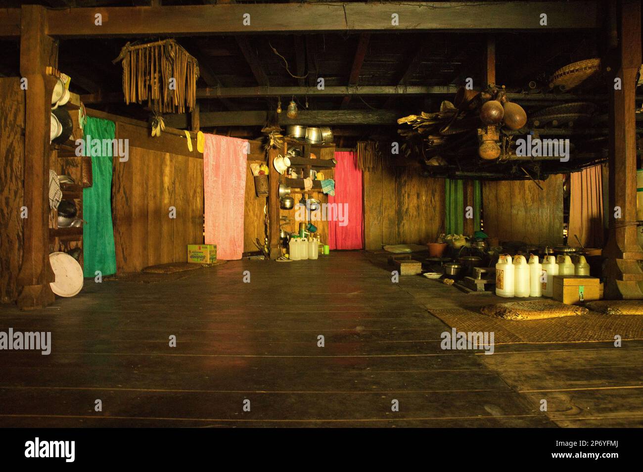 Interior of a traditional hut at Wae Rebo Village on Flores Stock Photo ...