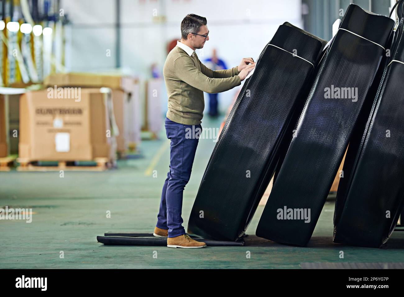 We make the best product in the industry. a man standing next to large ...