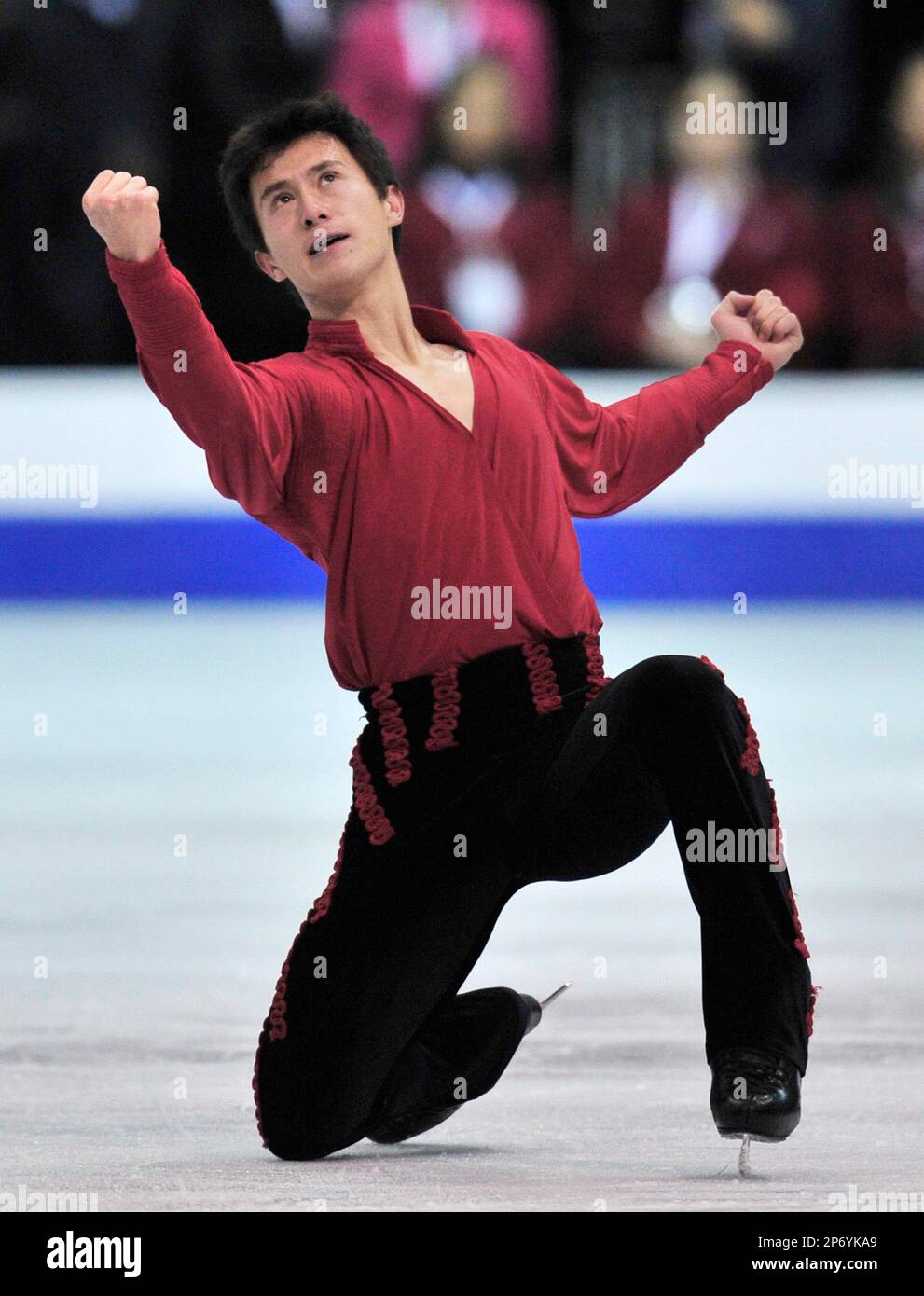 Men's gold medalist Patrick Chan, of Canada, reacts at the end of his ...