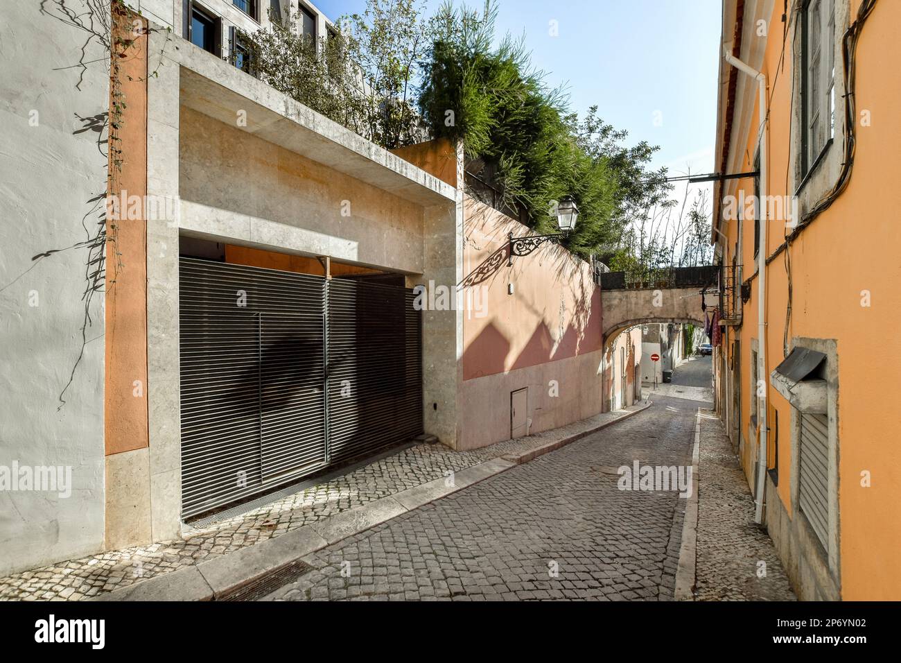 an empty street with no cars or people on the road and buildings in the ...