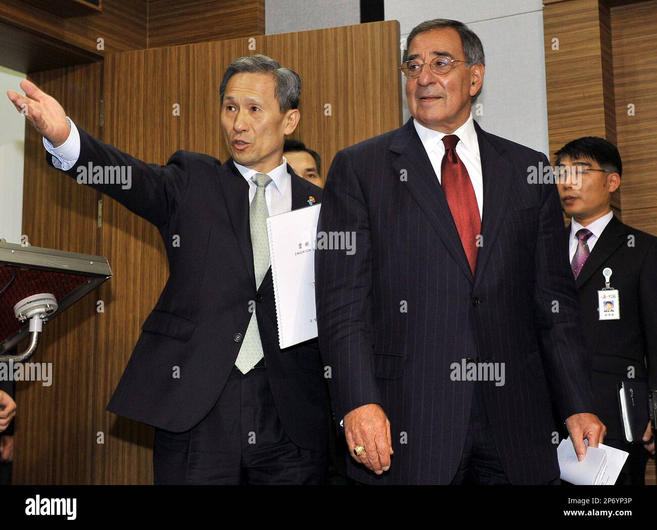 South Korean Defense Minister Kim Kwan-jin, left, ushers in U.S. Defense Secretary Leon Panetta ...
