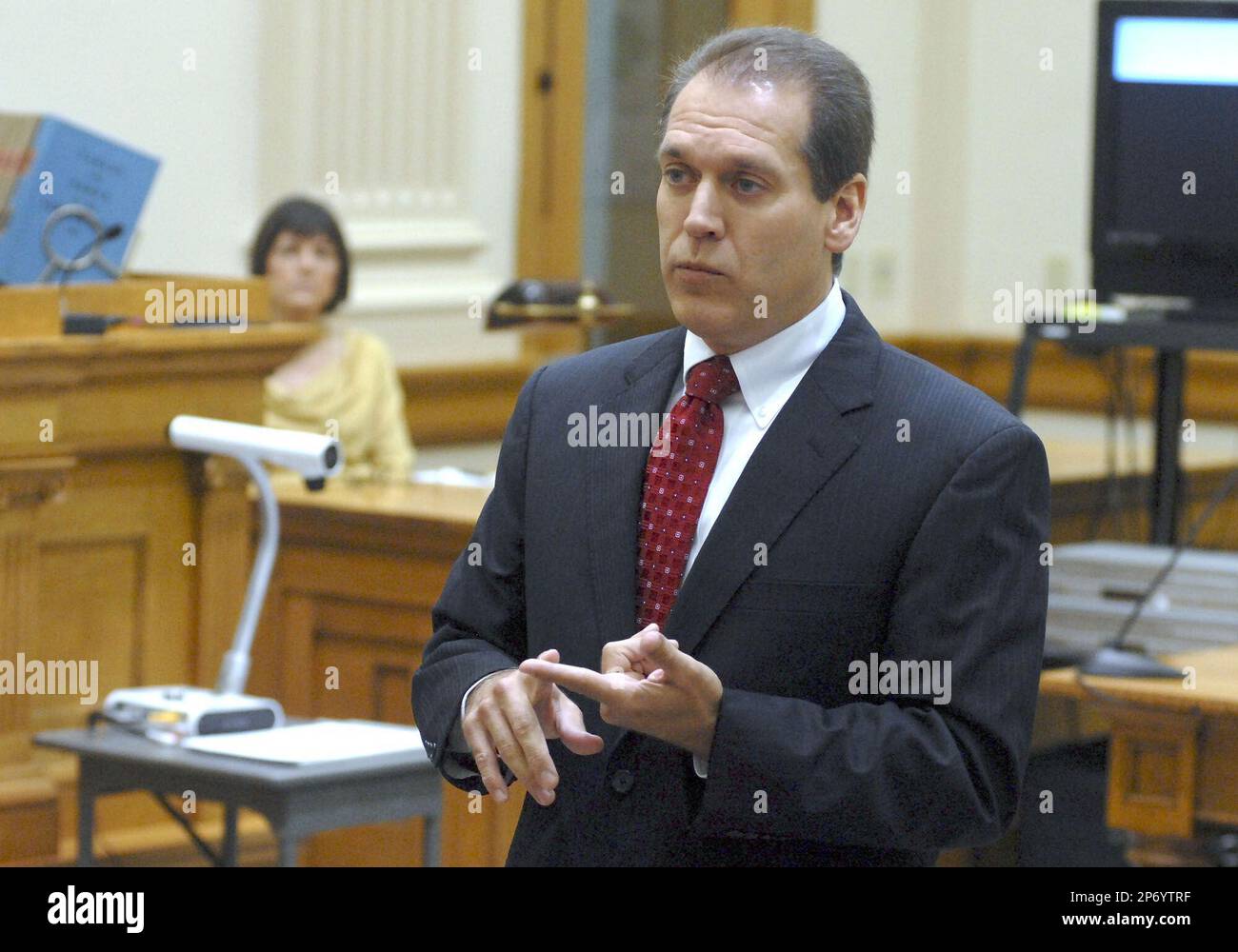 Assistant Iowa Attorney General Doug Hammerand presents opening ...