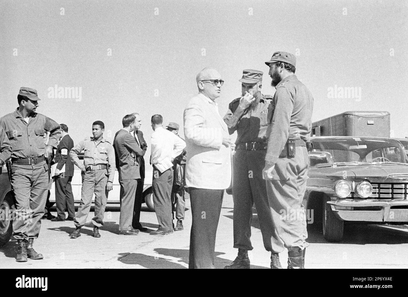 Cuban leader Fidel Castro, right, speaks to unidentified people during ...