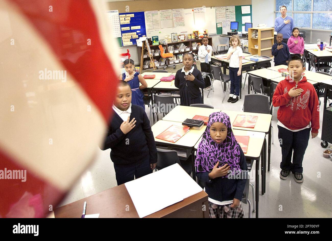Rainier View Elementary third grade students recite the Pledge of ...