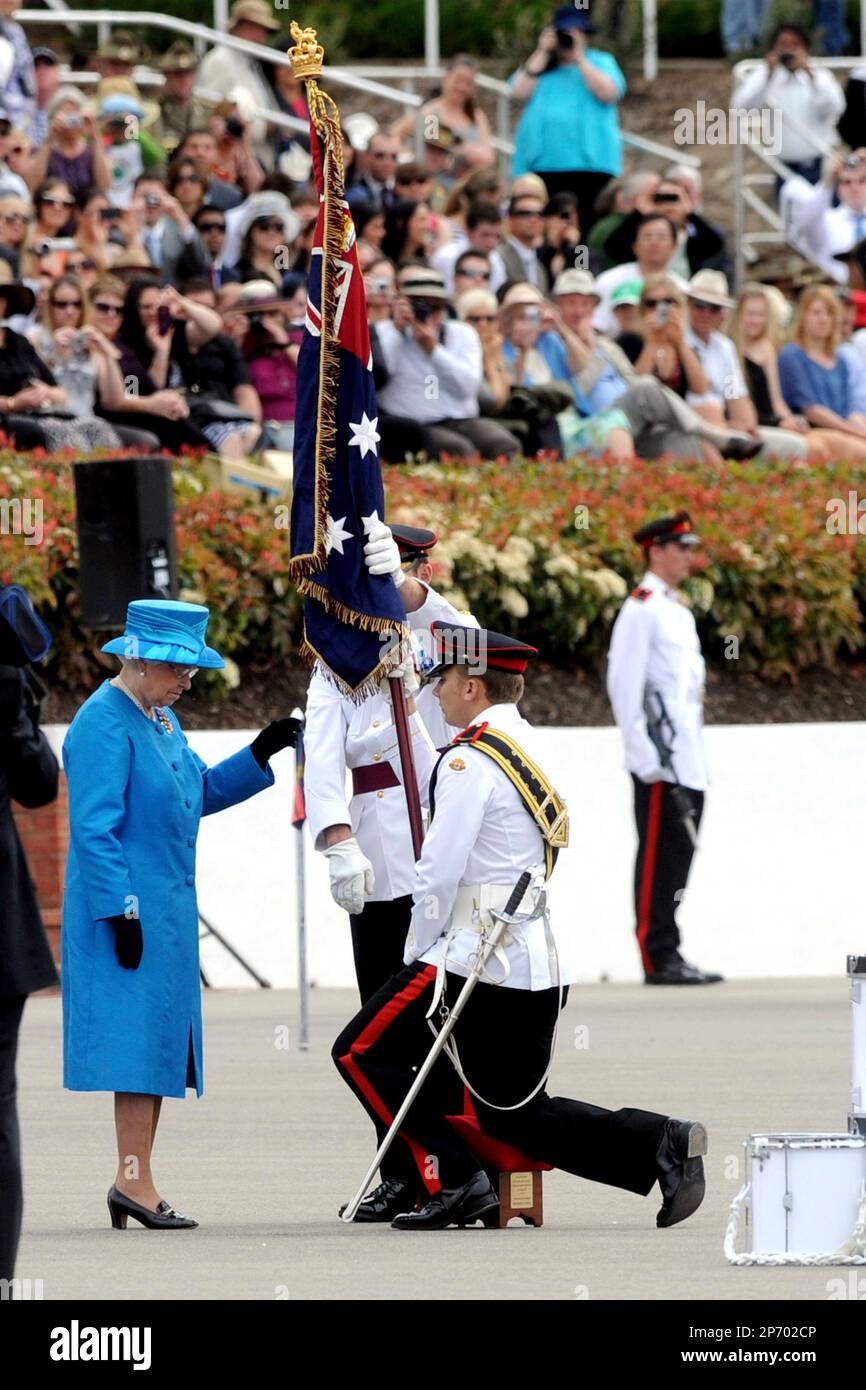 Queen Elizabeth II presents new colors to the Royal Military College ...