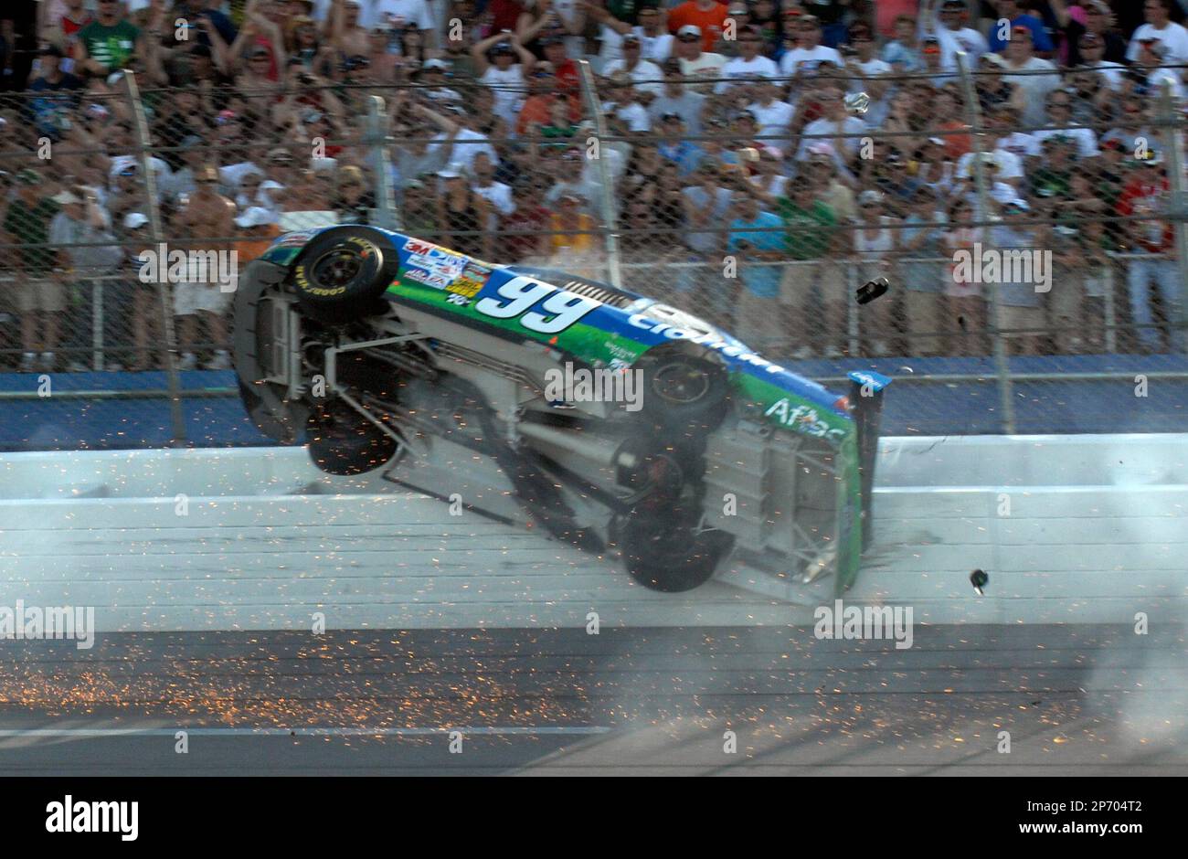FILE - This April 26, 2009 file photo shows Carl Edwards hitting the ...