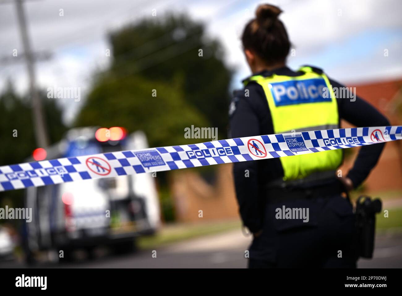 Victoria Police tape restricts access to a crime scene in Melbourne's ...