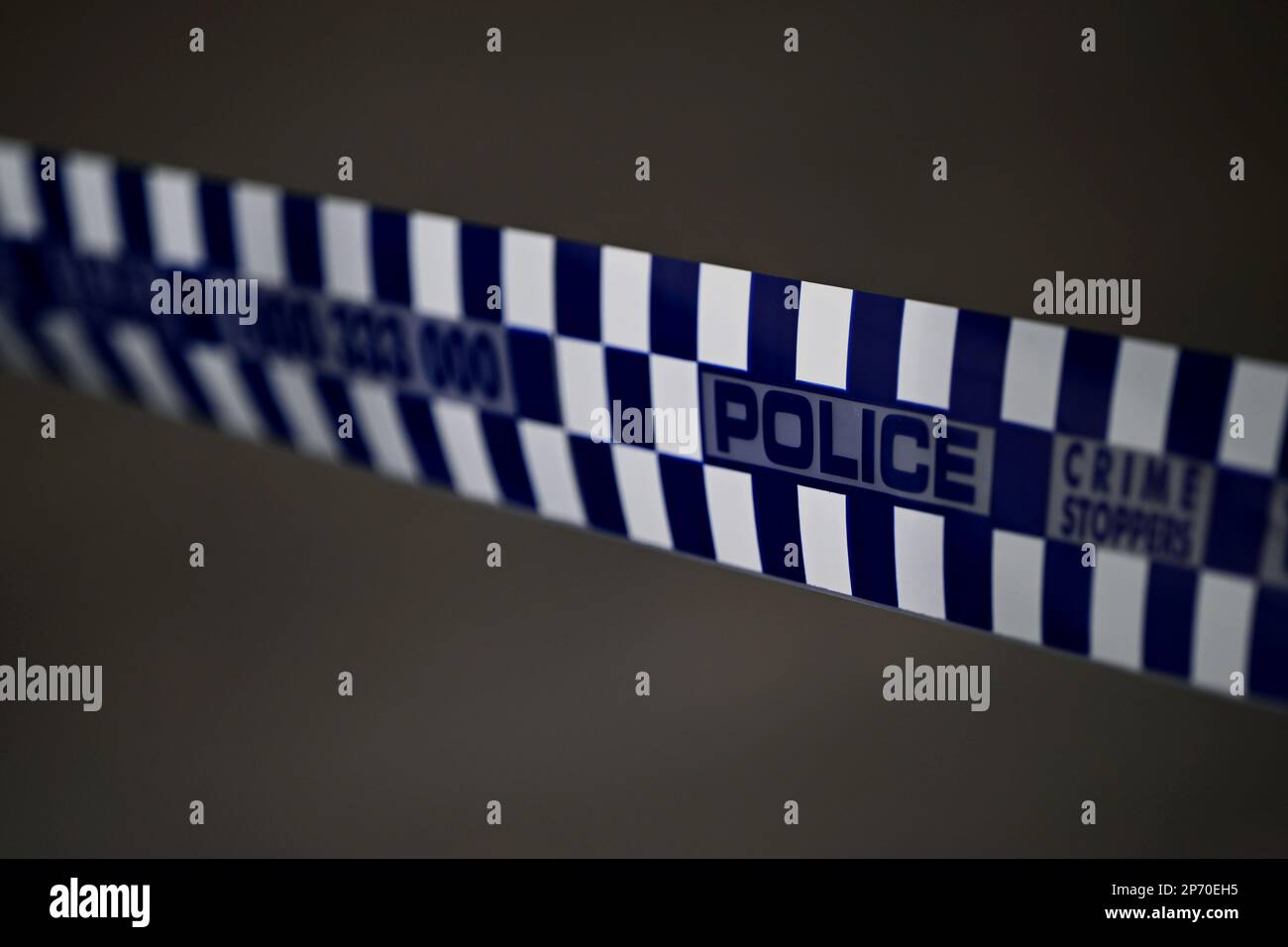 Victoria Police tape restricts access to a crime scene in Melbourne's ...
