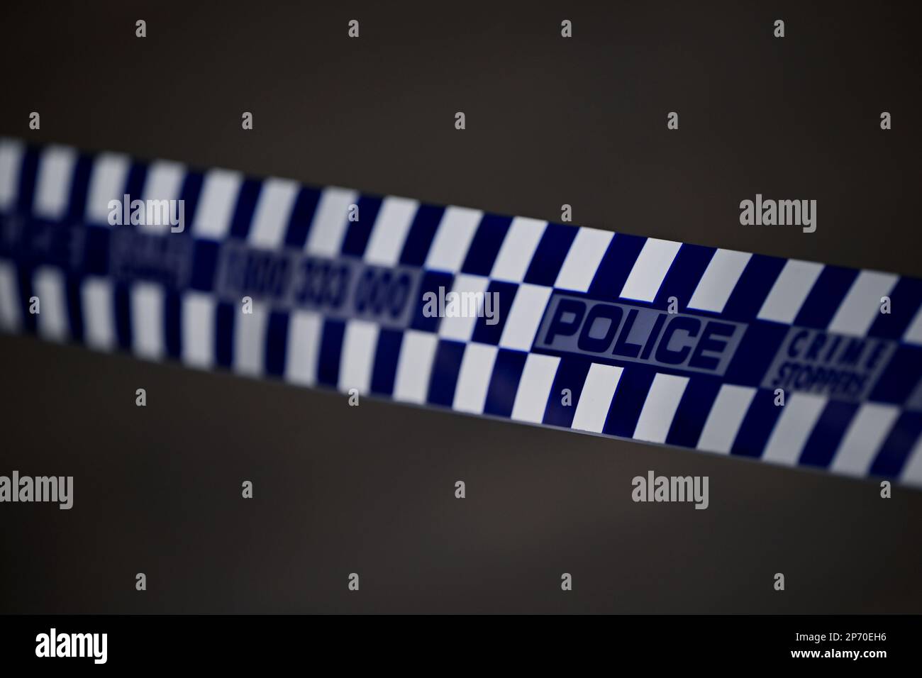 Victoria Police tape restricts access to a crime scene in Melbourne's ...